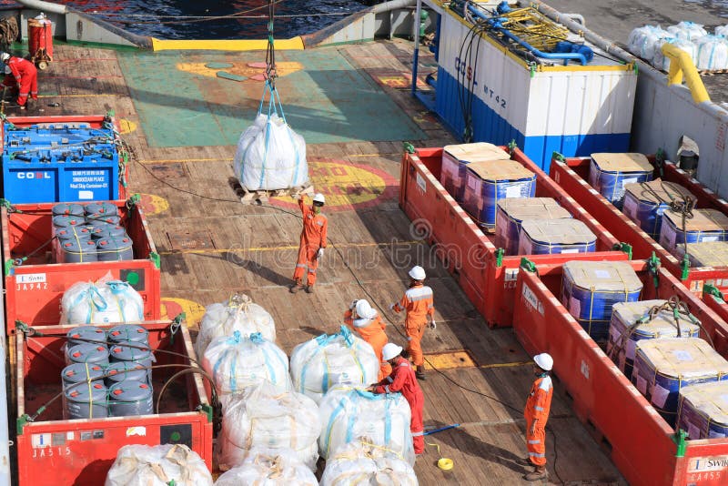 Banyuwangi, May 2022. Several Stevedores are Assisting the Process of ...