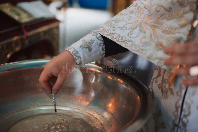 Baptism Ceremony of a Child in the Church, Details of the Baptism ...