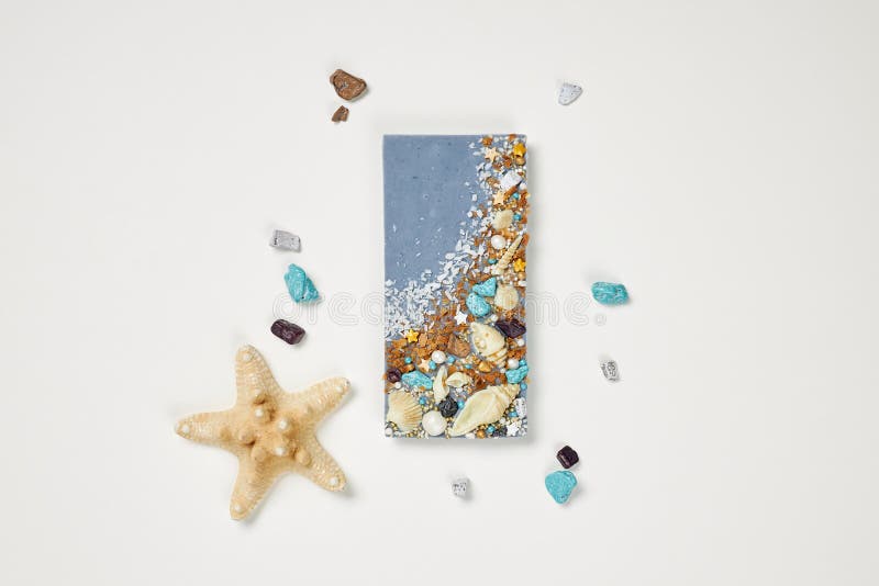 Bar of Blue Chocolate Decorated with Sea Shells Stock Photo - Image of ...
