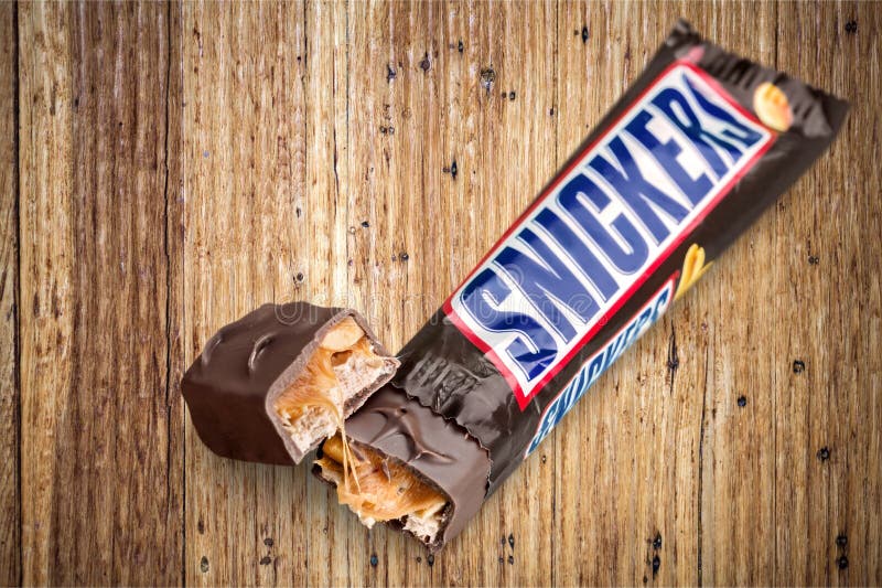 Snickers Chocolate Bar on Wooden Background Editorial Image - Image of ... Snickers Chocolate Bar on Wooden Background Editorial Image - Image of ...