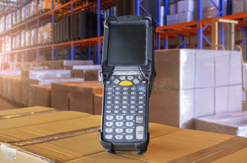 Bar Code Scanner on Cardboard Box at the Warehouse Storage. Computer ...