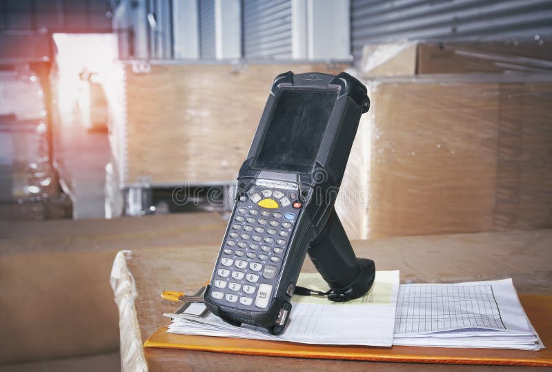 Bar Code Scanner and Clipboard on Package Boxes in the Storage ...