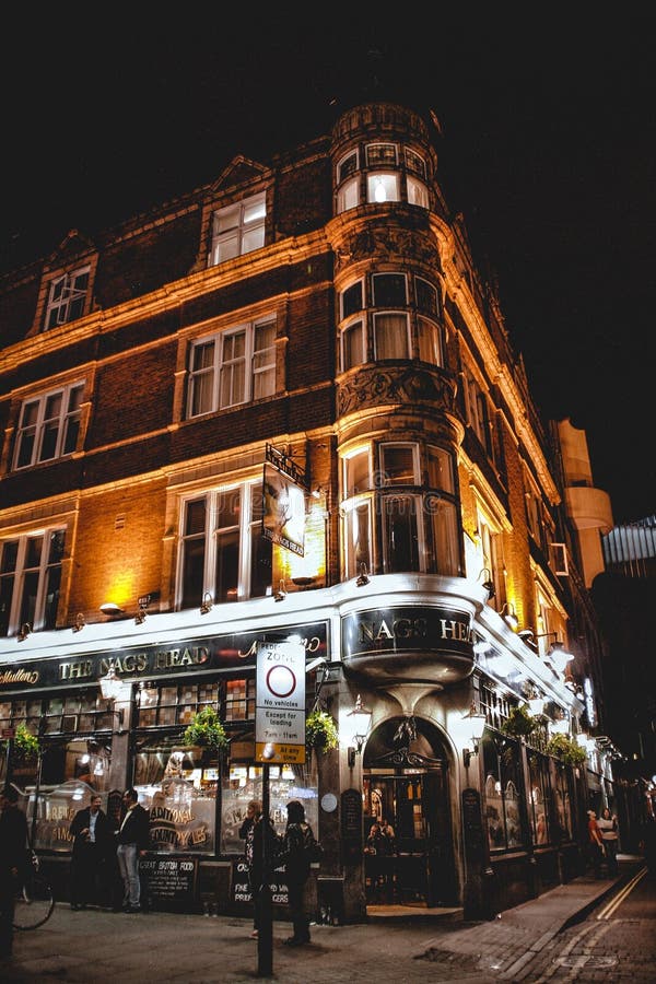 Bar at the Corder of the Building Editorial Image - Image of lighting ...