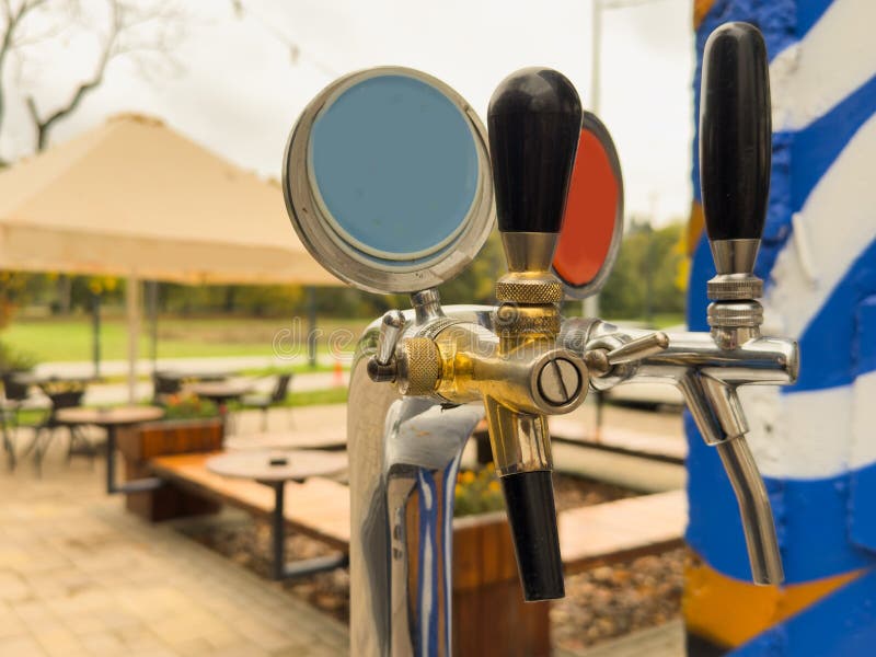 Bar Counter with Draft Beer Taps in Open-air Cafe Stock Photo - Image ...