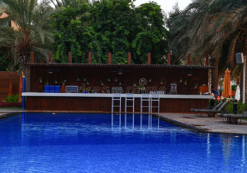 Bar Counter Next To the Blue Pool in the Hotel. Stock Photo - Image of ...