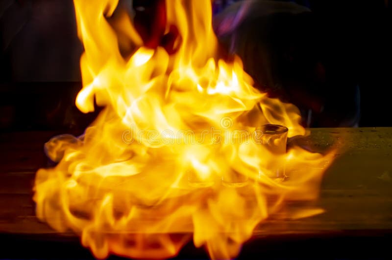 Bar Counter with Three Cocktails on Fire Stock Image - Image of counter ...