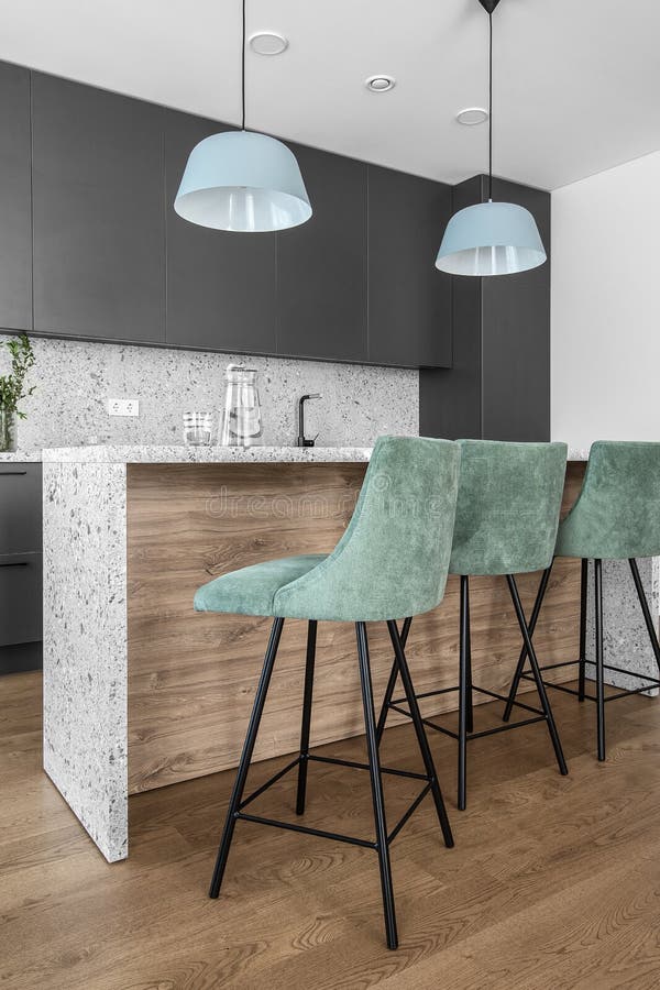 Bar Counter with Three Bar Stools and the Kitchen Grey Stone Effect ...