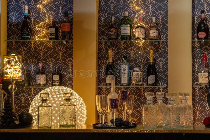 Bar with Drink Bottles and Glowing Lights Editorial Image - Image of ...