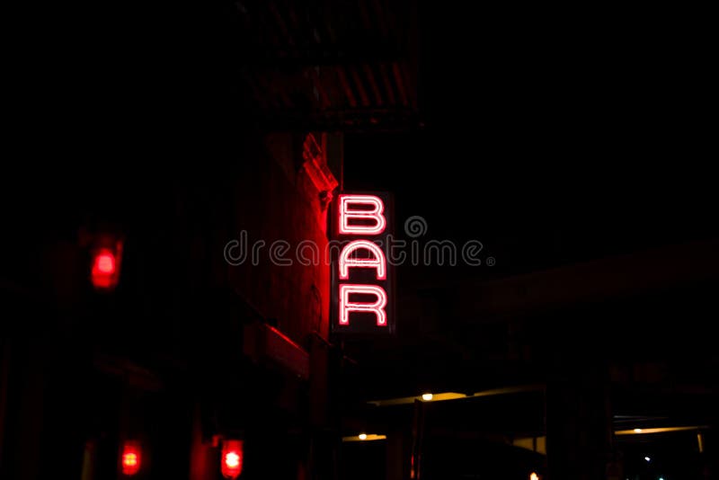 Bar Neon Sign on the Wall in the Night Stock Photo - Image of black ...