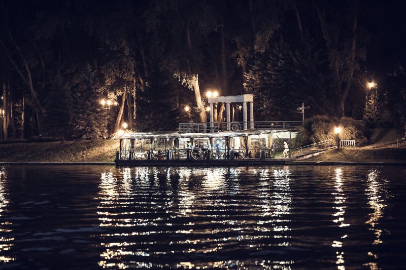 Bar on the River Bank at Night. Restaurant on the Water Stock Image ...
