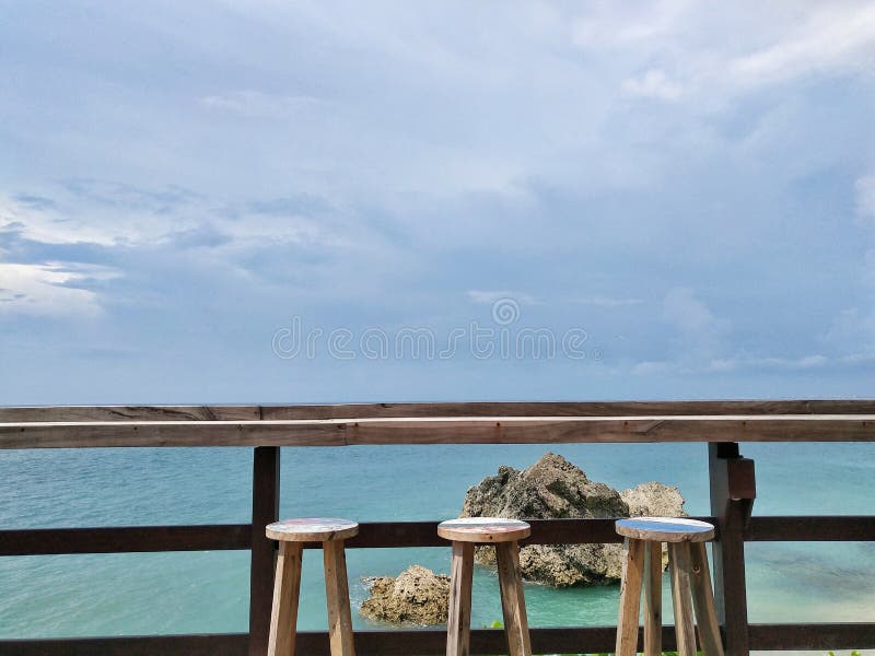 Bar stool with ocean view stock photo. Image of shore - 107511684