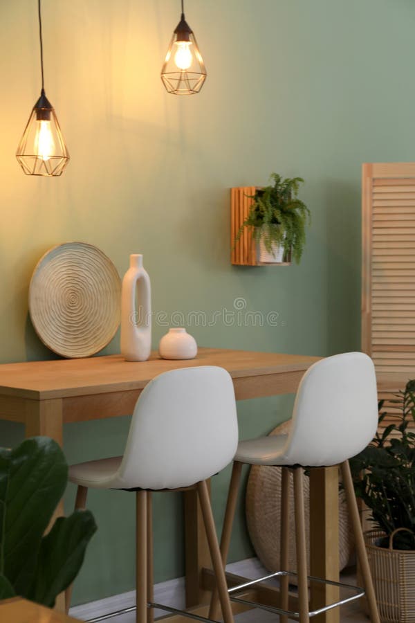 Bar Stools, Table and Plants in Room. Stylish Interior Design Stock ...