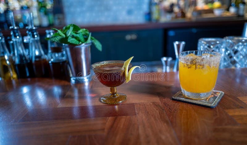 Bar Table with Assorted Cocktails in a Trendy Bar Setting Stock Photo ...