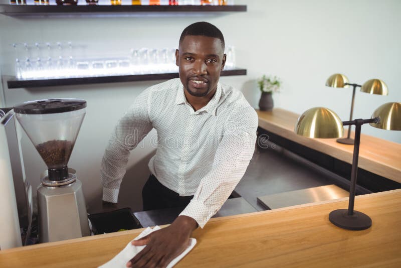 Bar Tender Cleaning Bar Counter in Restaurant Stock Photo - Image of ...
