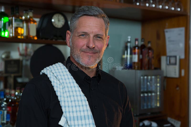 Bar Tender Standing at Bar Counter Stock Photo - Image of brewery ...