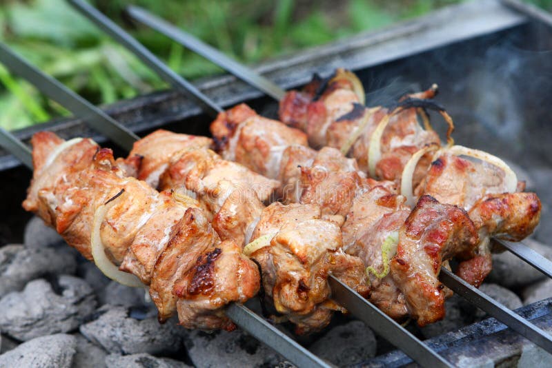 Shashlik - Russian Barbecue is Prepared on the Grill Stock Photo ...