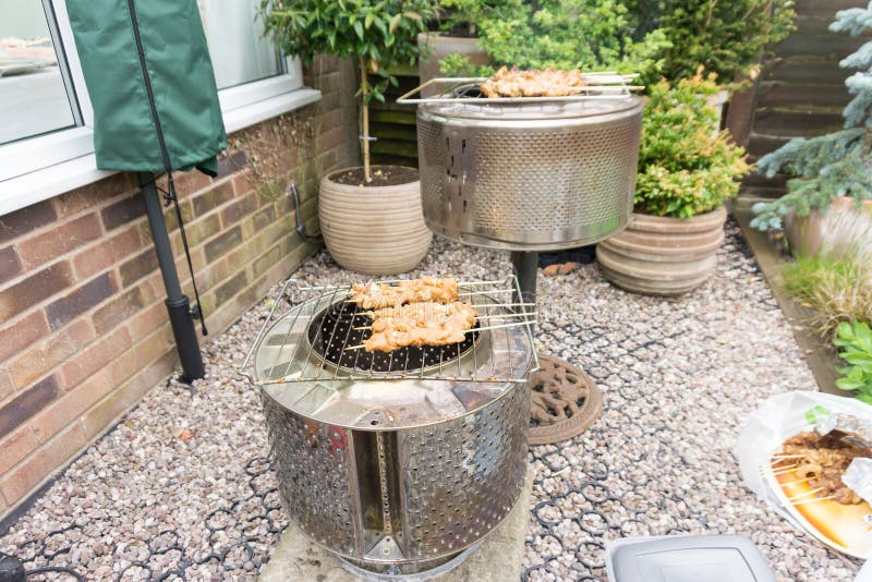 Barbecue in a back garden stock photo. Image of pathways - 87780338