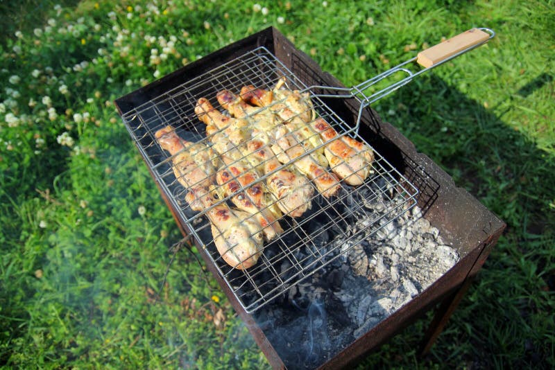 Barbecue with Chicken in Metal Grate Stock Image - Image of gourmet ...