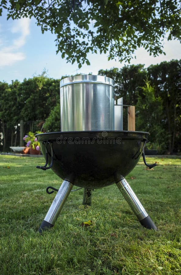 Barbecue chimney for coal editorial photography. Image of black - 324130207