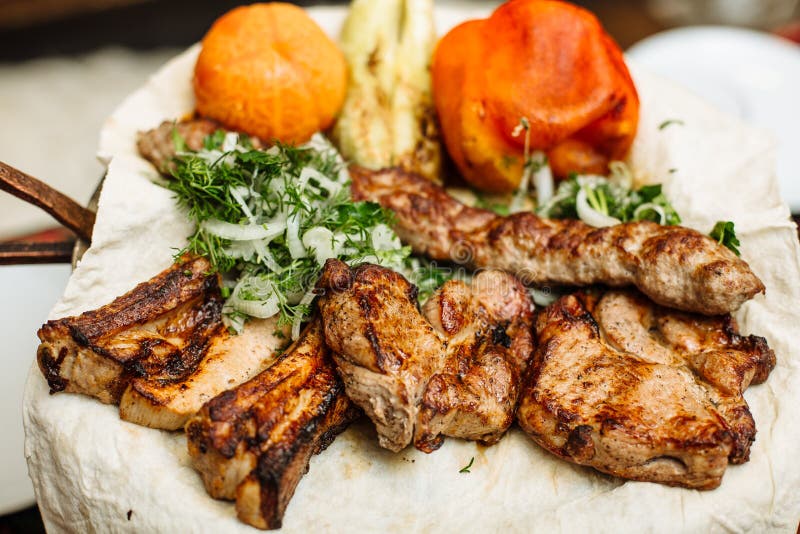 Barbecue, Cooked Different Meat with Grilled Vegetables Stock Photo ...