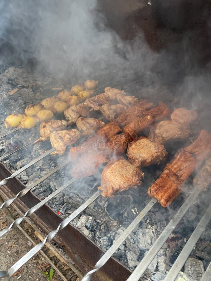 Barbecue Cooking Meat and Barbecue on the Grill for Food Stock Photo ...
