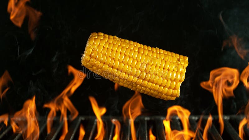 Barbecue Grill with Falling Corn Stock Photo - Image of copy, grilled ...