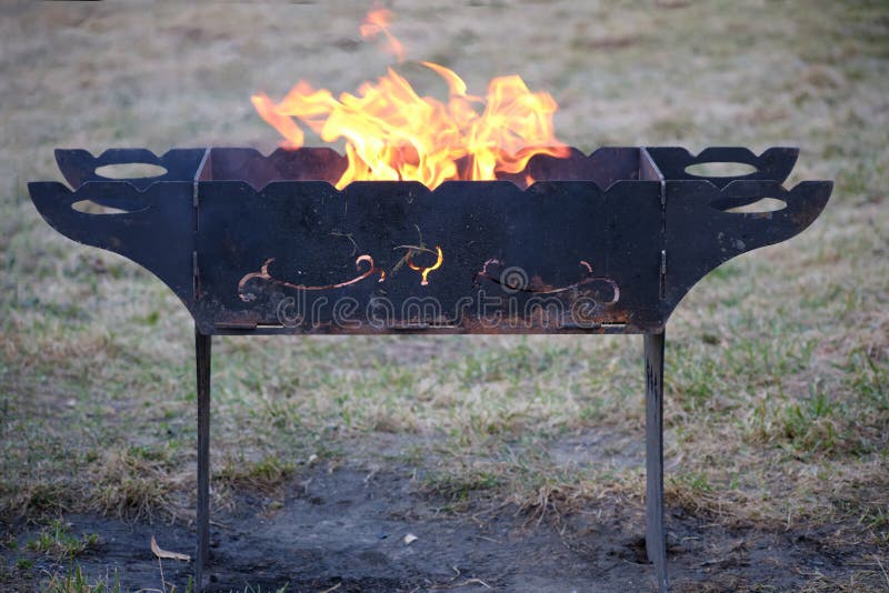 Barbecue Grill with Fire on Open Air. Fire Flame Stock Photo - Image of ...