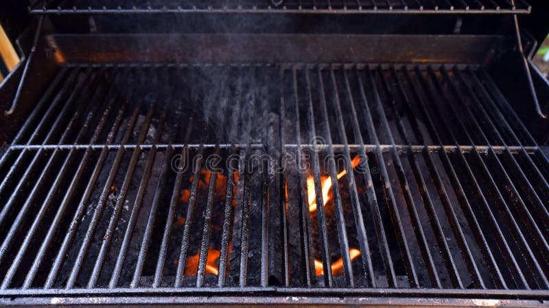 Barbecue grill with flames stock image. Image of cooking - 148880569