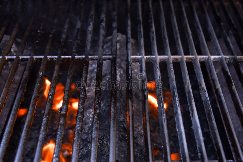 Barbecue grill with flames stock photo. Image of gross - 148880902