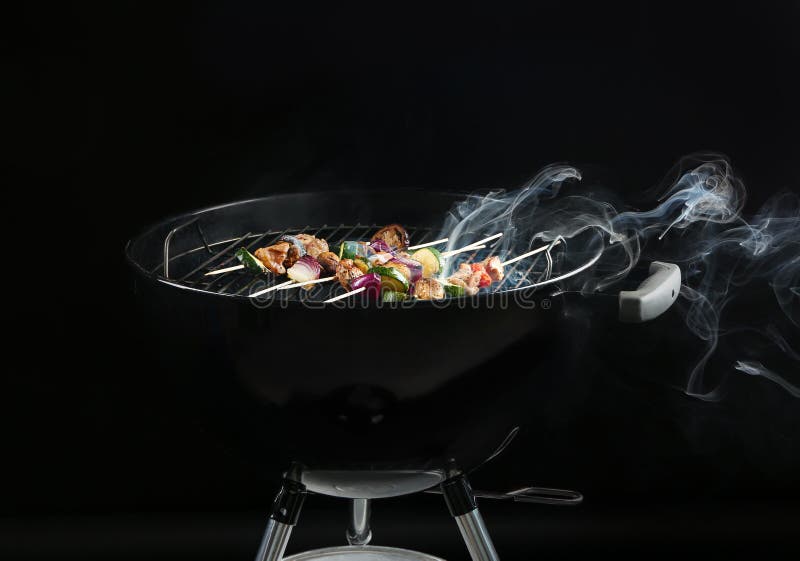 Barbecue Grill with Meat and Vegetables on Dark Background Stock Image ...
