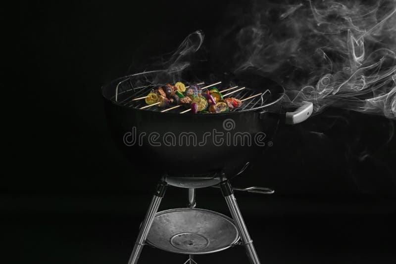 Barbecue Grill with Meat and Vegetables on Dark Background Stock Photo ...