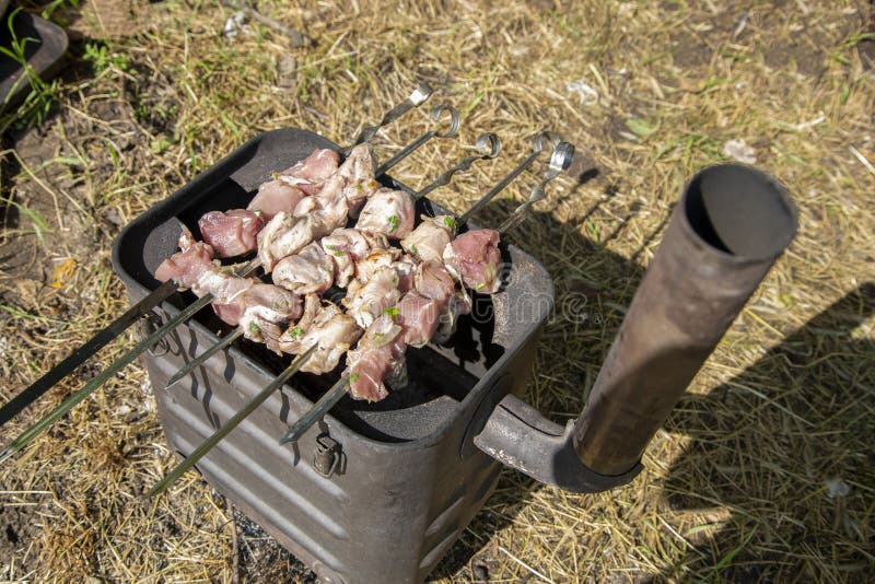Barbecue on a Metal Stove with a Chimney Outdoors, Top View Stock Photo ...