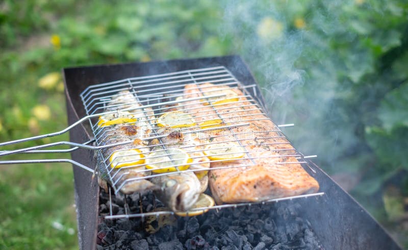 Barbecue Outdoors with Grilled Fish Stock Photo - Image of outdoor ...