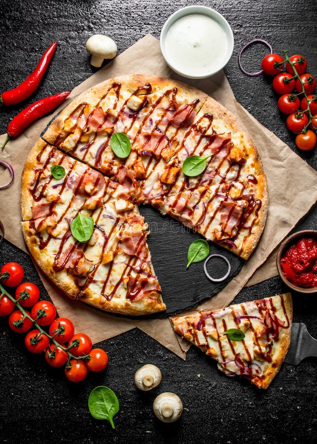 Barbecue Pizza with Spinach Leaves, Cherry Tomatoes and Cheese Sauce ...