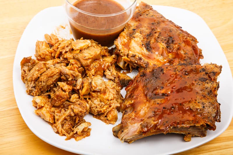 Barbecue Pulled Pork and Ribs with Sauce Stock Photo - Image of gourmet ...