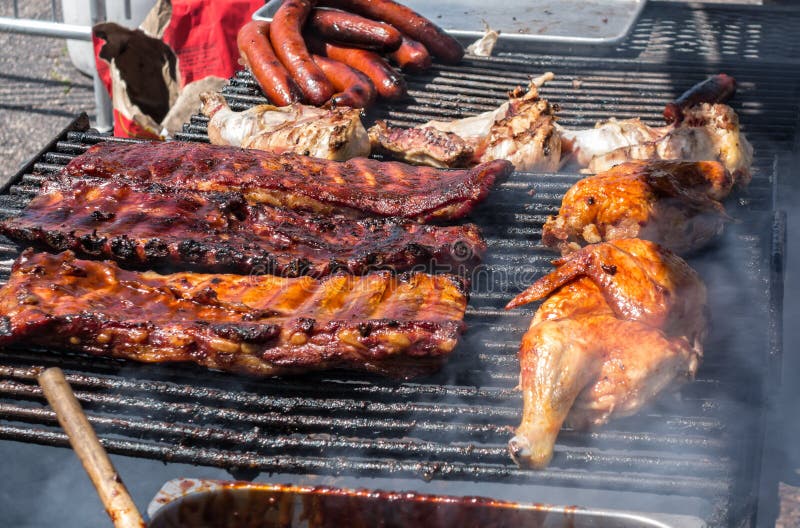 Barbecue with Ribs, Chicken and Sausage Stock Photo - Image of downtown ...