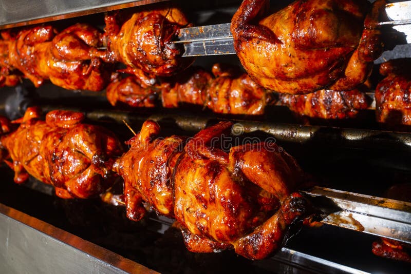 Barbecue Roast Chicken in a Row Turning at Industrial Roaster Stock ...