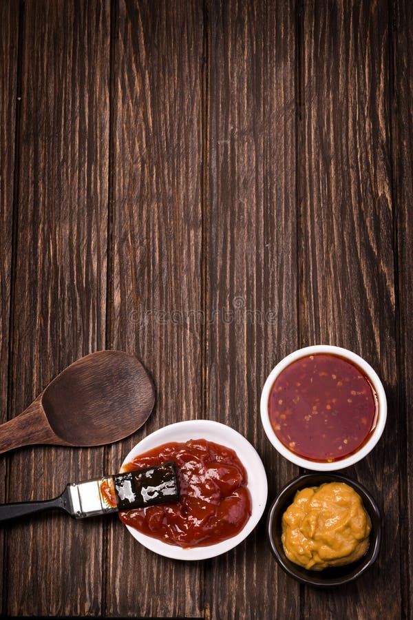Barbecue Sauce Over Rustic Barn Wood Table Stock Photo - Image of table ...