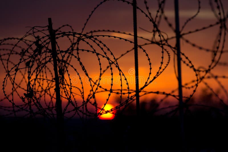 Sunset and barbed wire stock photo. Image of nature, cloudscape - 23389366