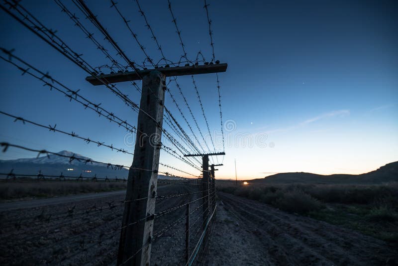 Barbed Wire Along the Field Stock Image - Image of countryside, barbed ...