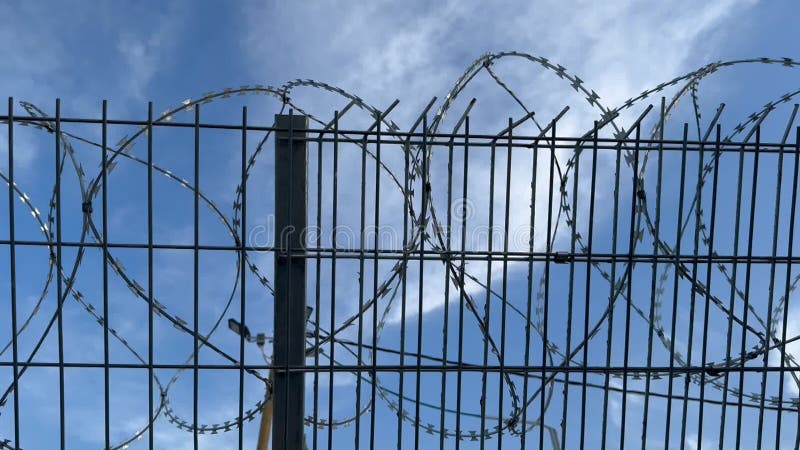 Barbed Wire Around a Building Stock Footage - Video of blue, sharp ...