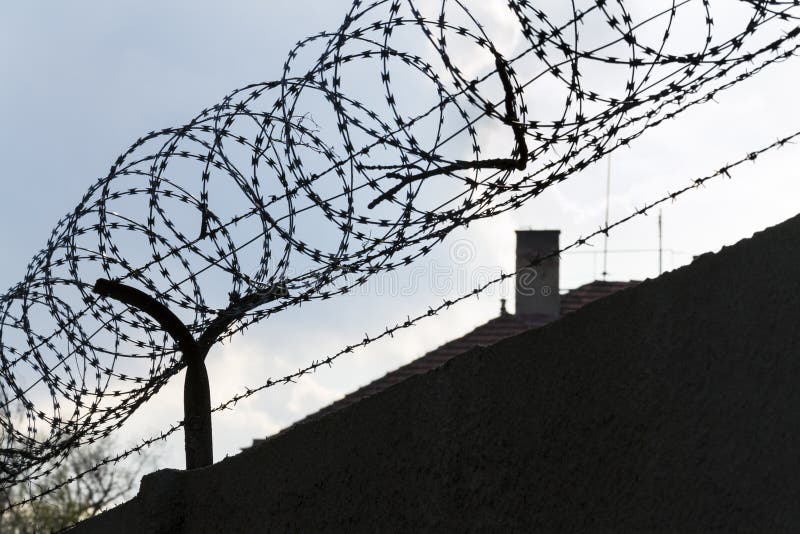 Barbed Wire Fence Around Prison Walls Blue Sky Stock Image - Image of ...