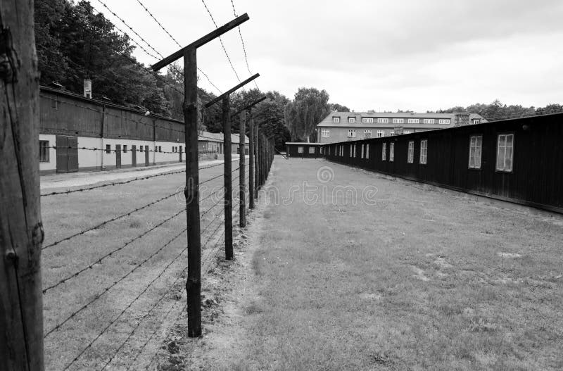 Barbed Wire Fence And Barracks In Concentration Camp Stutthof Editorial ...