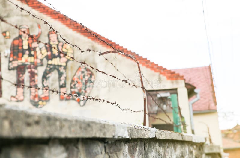 Barbed Wire Near the House with Graffiti Stock Photo - Image of wire ...