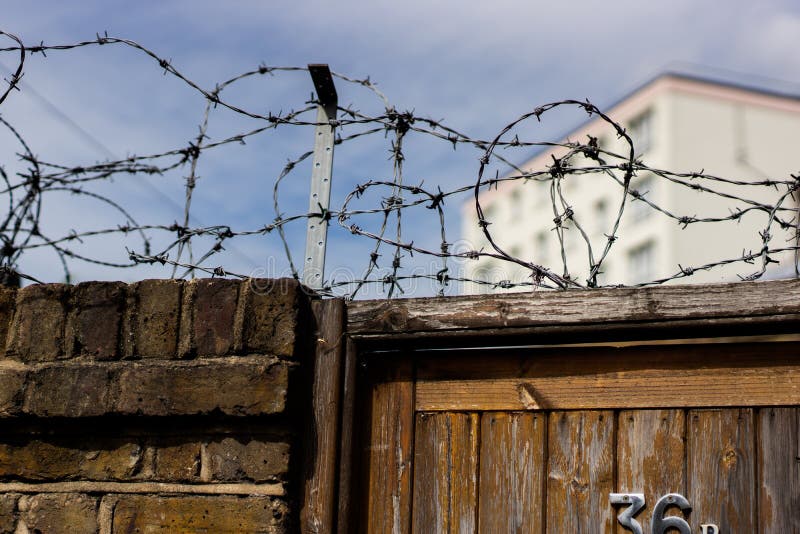 Barbed Wire Protecting the Jail Stock Photo - Image of cityscape ...