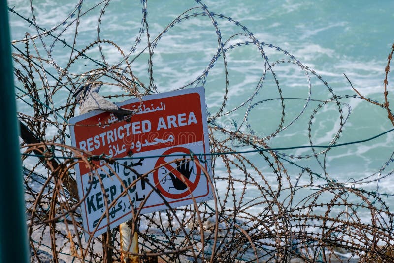 Barbed Wire and Restricted Area Sign Stock Photo - Image of restricted ...