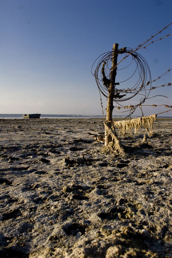 Barbed Wire by the Sea and Boat Stock Image - Image of ship, fence ...