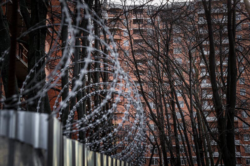 Barbed Wire in the Security of the Building Stock Image - Image of ...
