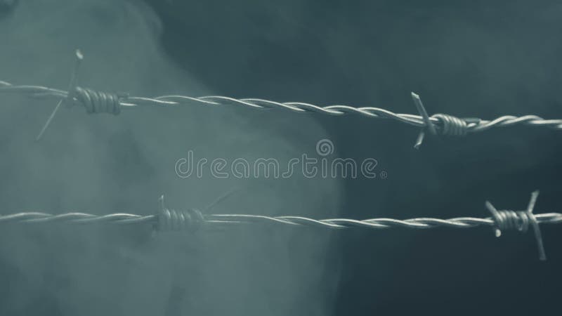 Barbed Wire with Thick Smoke Moving Shot Stock Footage - Video of ...
