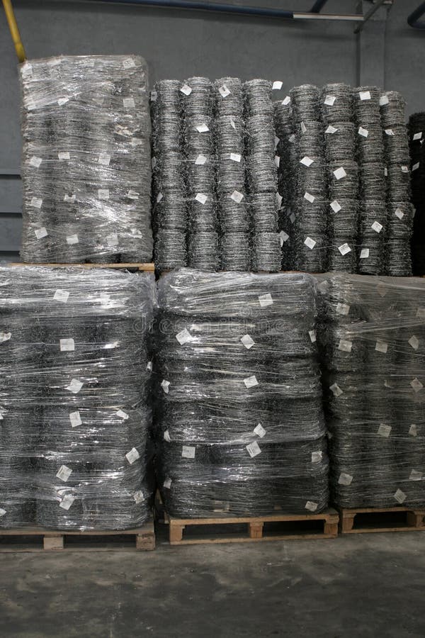 Barbed wire warehouse stock image. Image of industry - 39801337